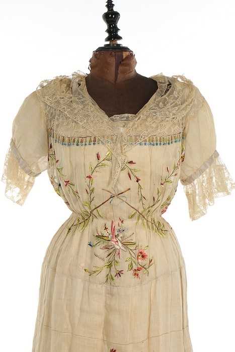 Lot 144 - An embroidered muslin dress, circa 1914-18,