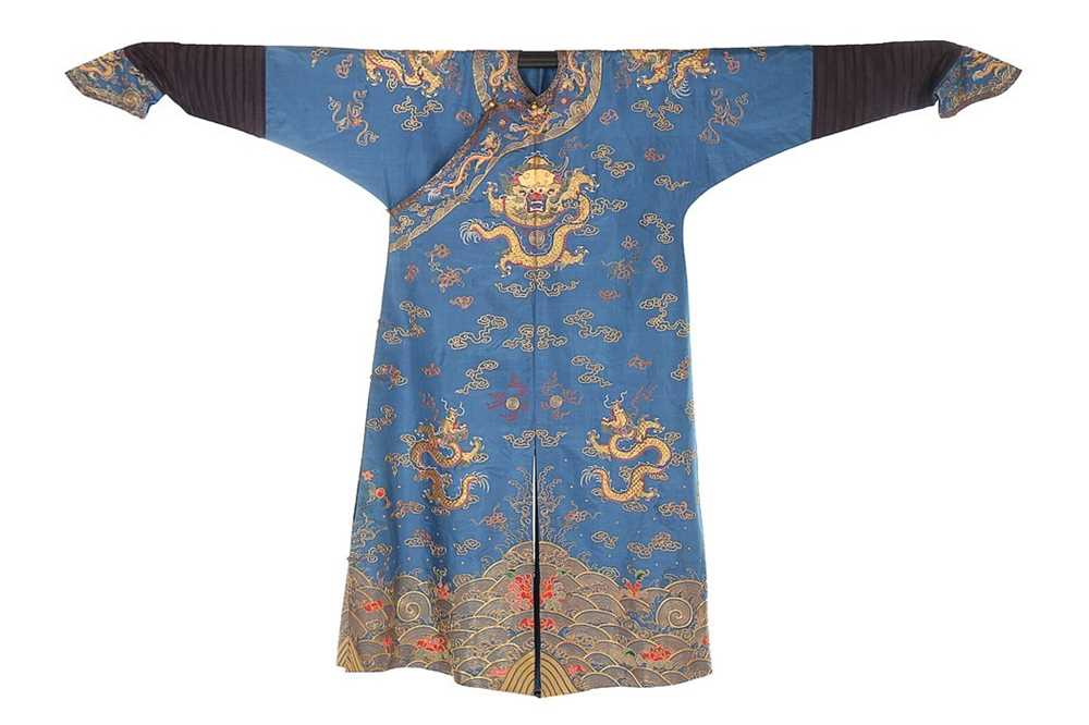 Lot 427 - An embroidered blue silk taffeta dragon robe,