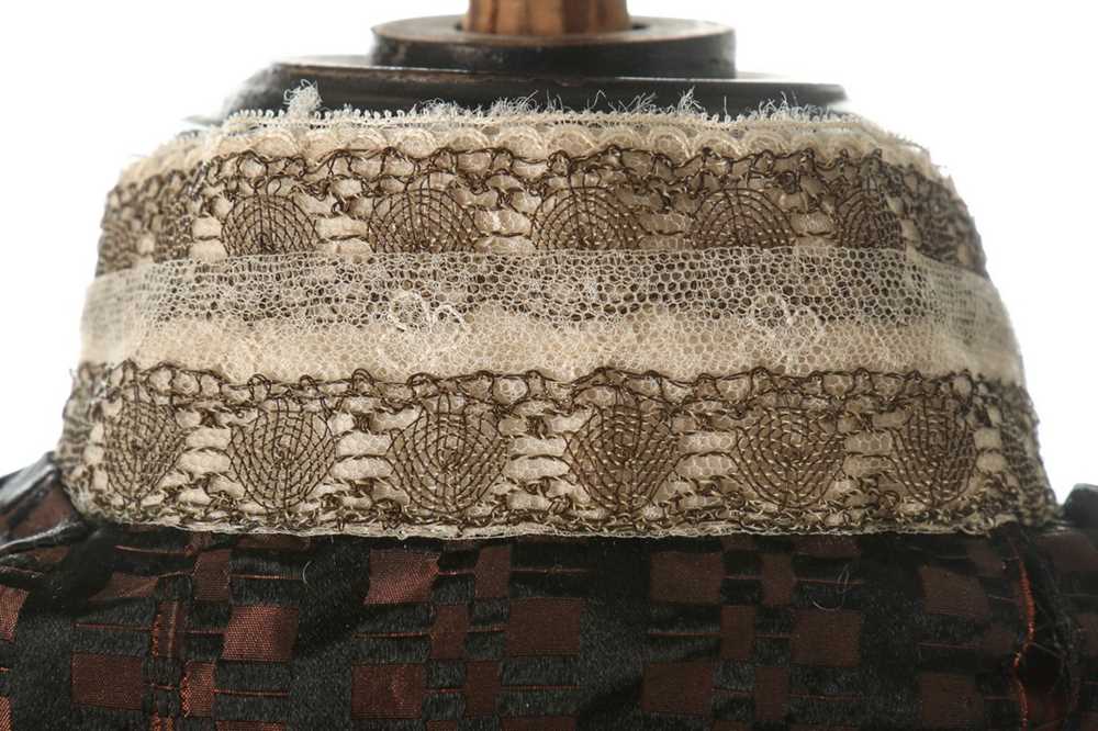 Lot 39 - A Maison Rouff brown and black checked