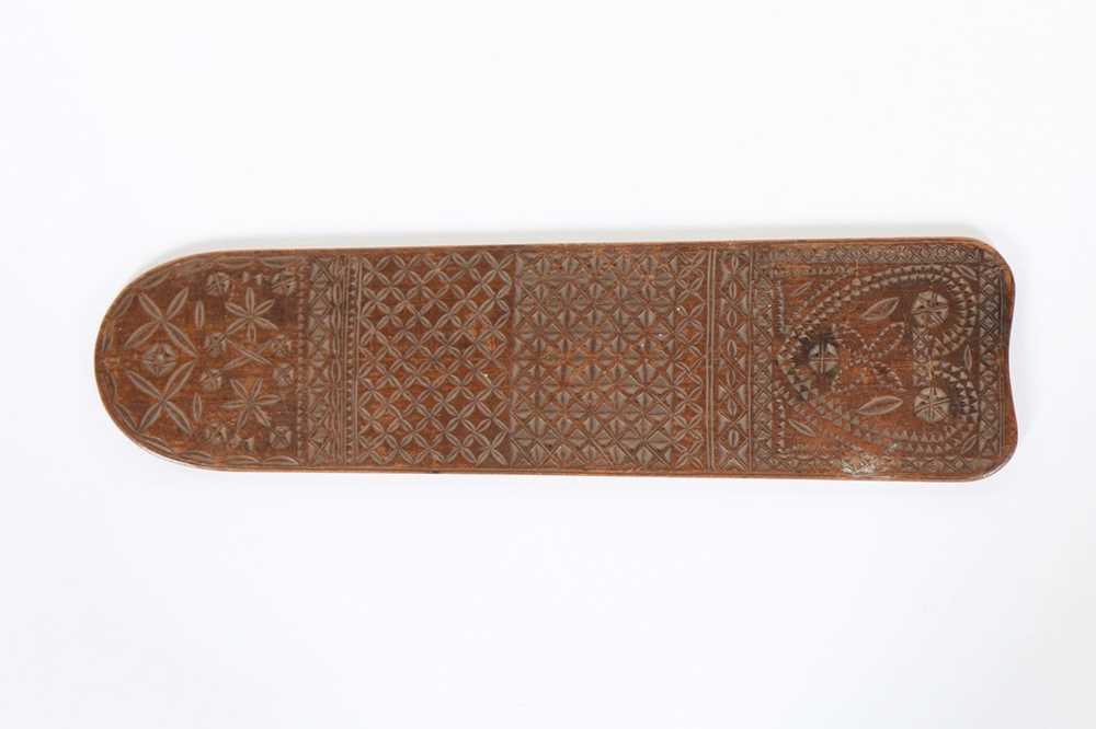 Lot 134 - A carved wooden busk, probably Welsh,
