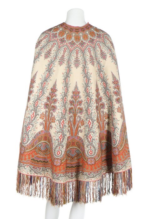 Lot 306 - A woven kashmir style cape, French, circa