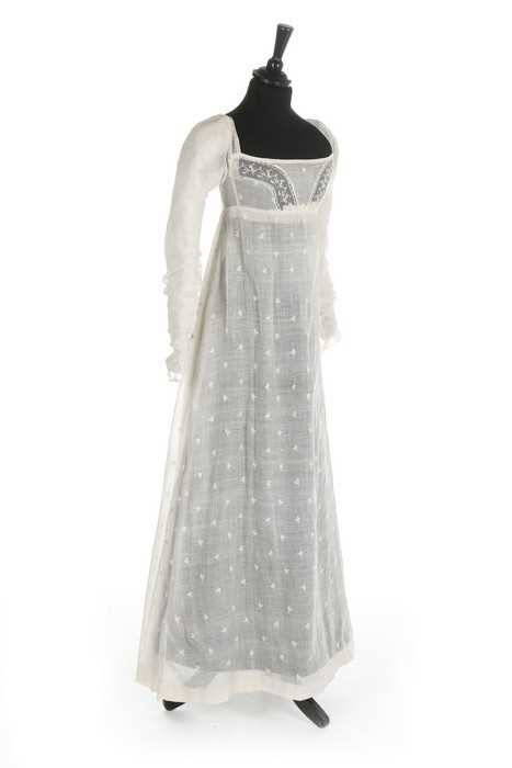 Lot 36 - A sprigged muslin dress, circa 1800, the