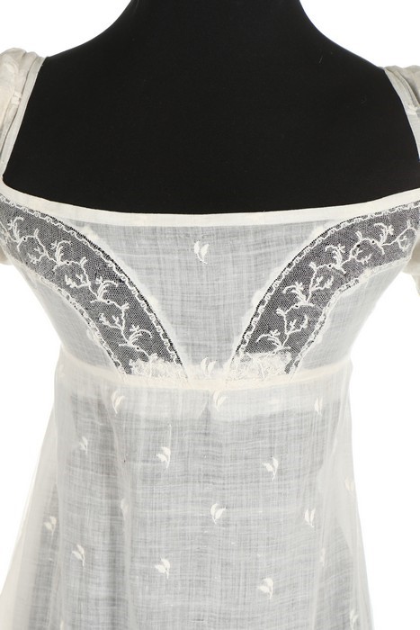 Lot 36 - A sprigged muslin dress, circa 1800, the