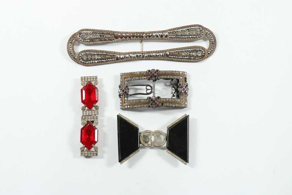 Lot 224 - A box of assorted buttons and buckles,
