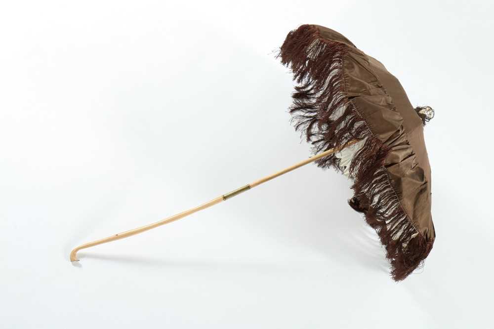 Lot 246 - A brown silk carriage parasol, 1870s, with
