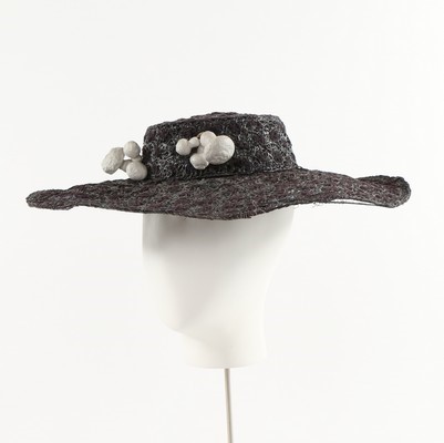 Lot 86 - A rare Schiaparelli painted straw hat, 'Pagan'