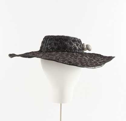 Lot 86 - A rare Schiaparelli painted straw hat, 'Pagan'