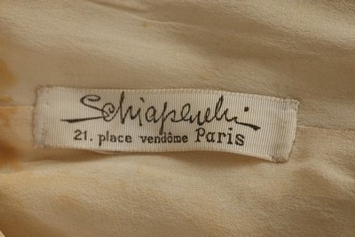 Lot 96 - A Schiaparelli figured ivory satin evening