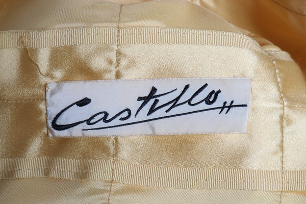 Lot 94 - An Antonio Castillo golden-yellow satin ball