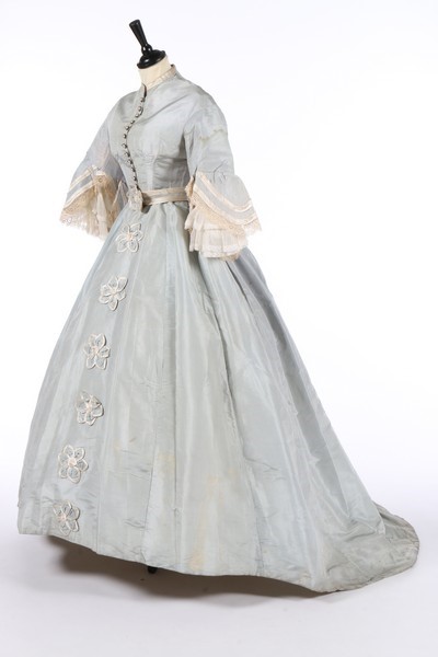 Lot 210 - A pale blue silk gown with day and evening