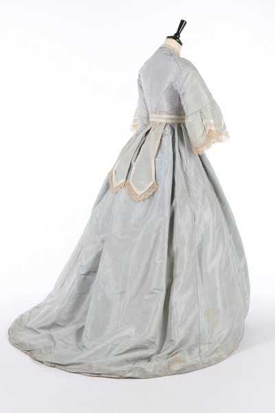 Lot 210 - A pale blue silk gown with day and evening