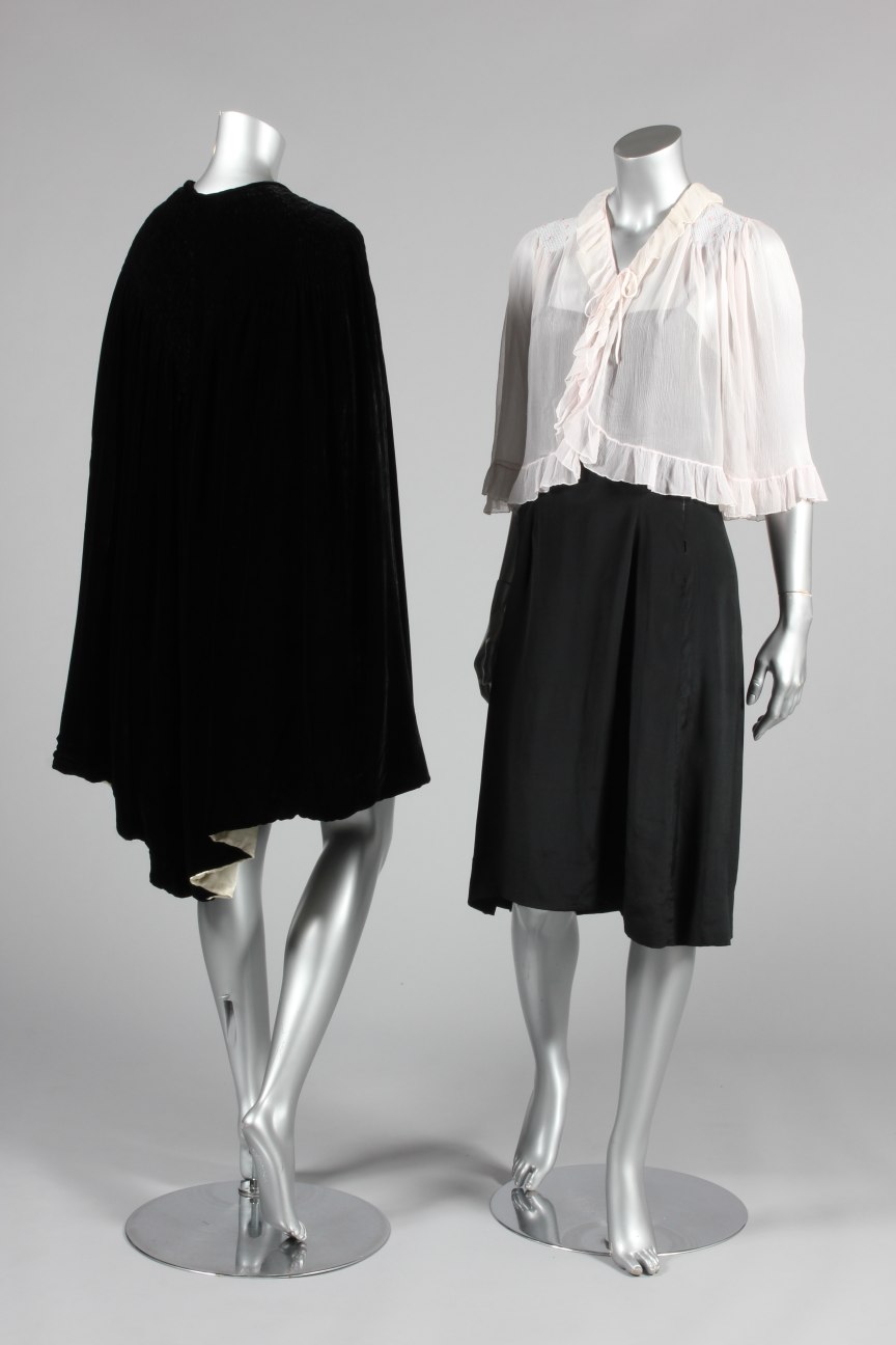 Lot 113 - An embroidered black satin flapper dress,