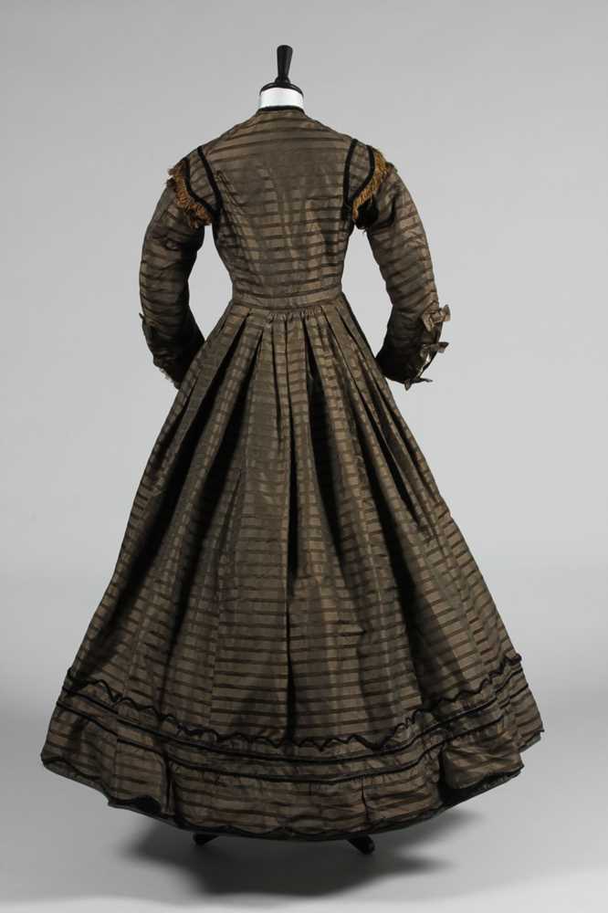 Lot 128 - A striped brown silk day dress, circa 1865,