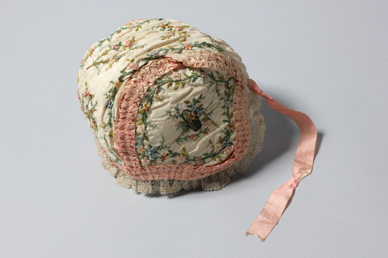 Lot 151 - Two silk baby bonnets, French, late 18th